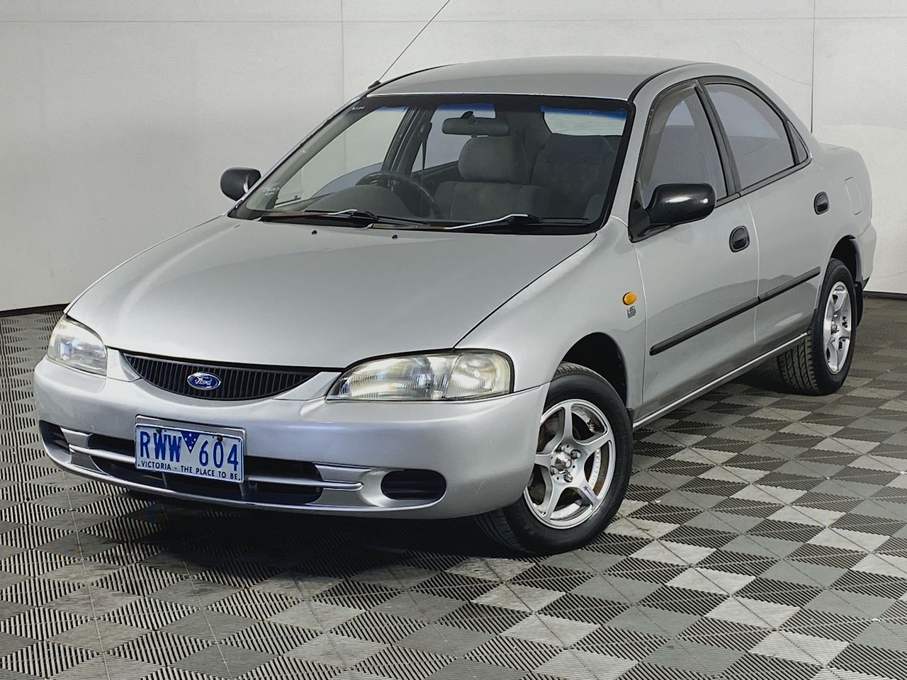 1998 Ford Laser LXi KJIII Automatic Sedan Auction (0001-21003707) | Grays Australia