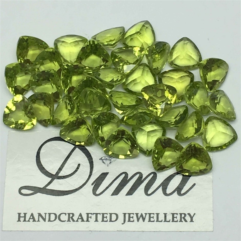Thirty Five Stones Peridot Triangle 42.88ct Auction (0001-2560122 ...
